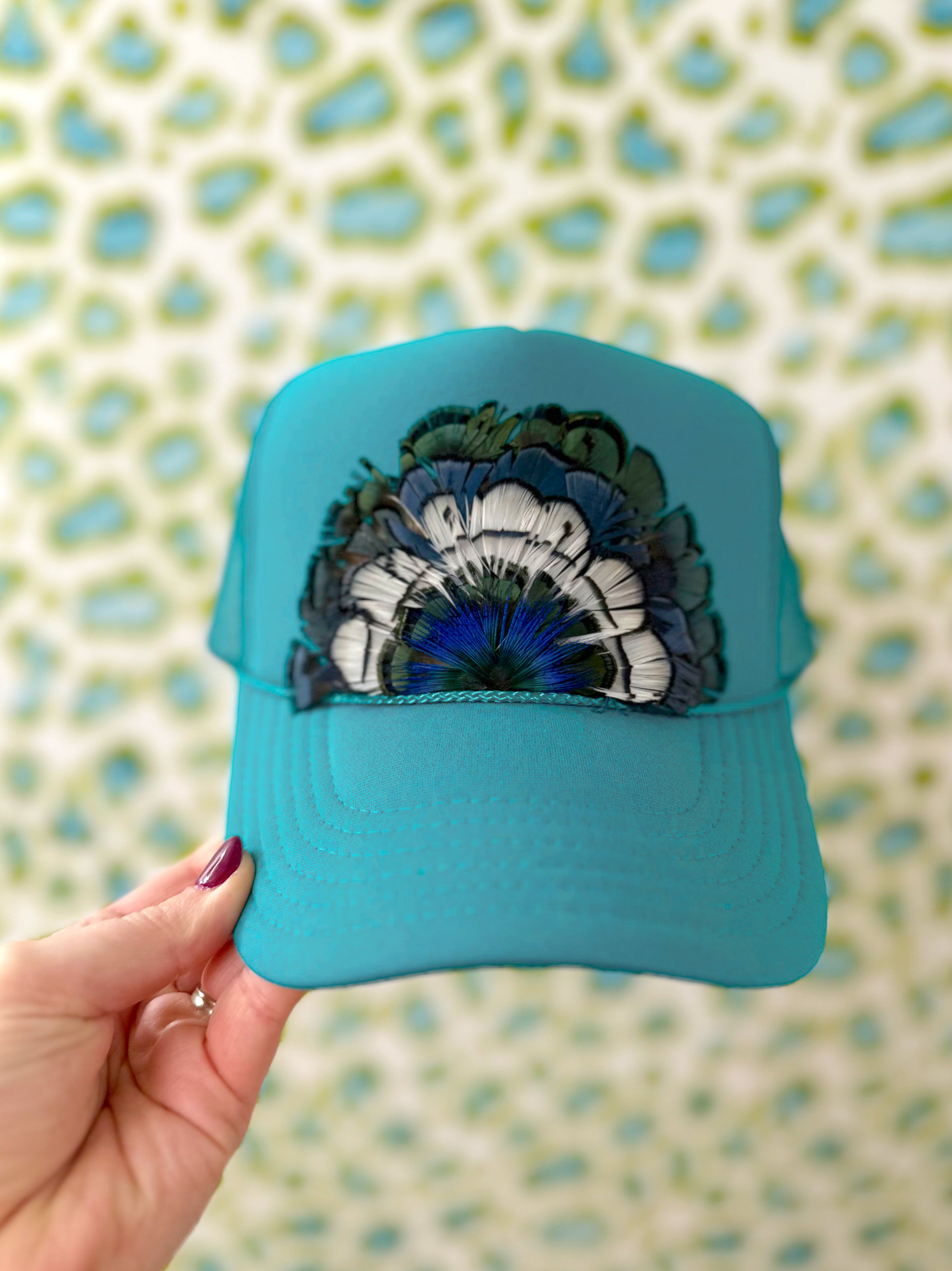 The Ansleigh Feathered Trucker Hat — Pecan Row